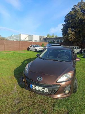 Brown Mazda 3 2012 in Marijampole, with an engine capacity of 2.00 L and mileage of 199 thousand km for 3099 €, photo  on AUTOMOTO.COM.LV