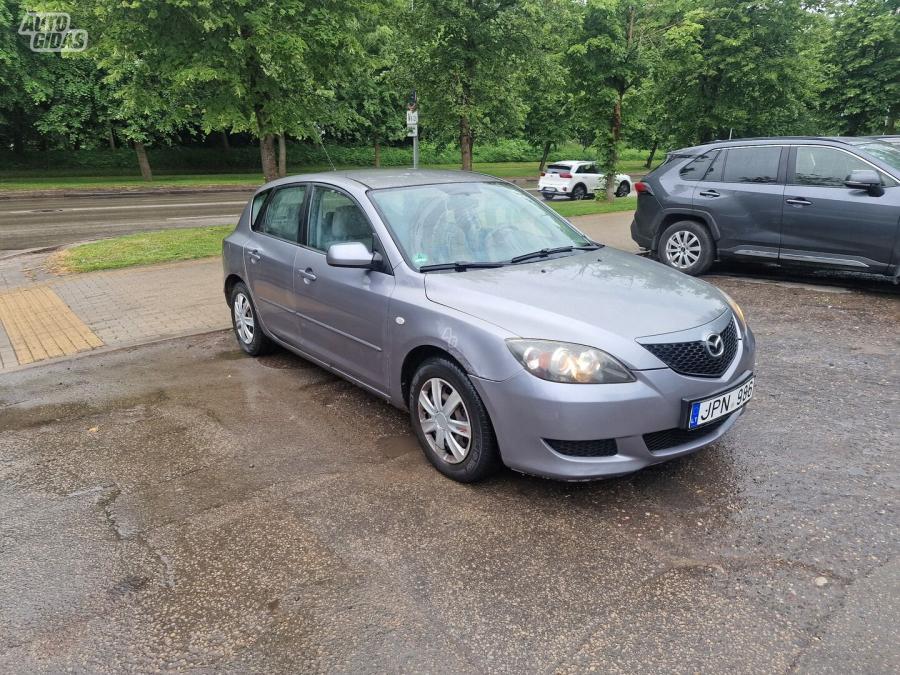 Pelēks Mazda 3 2004 Šauļi, ar dzinēja tilpumu 1.40 L un nobraukumu 290 tūkst. km par 350 €, foto 4 vietnē AUTOMOTO.COM.LV