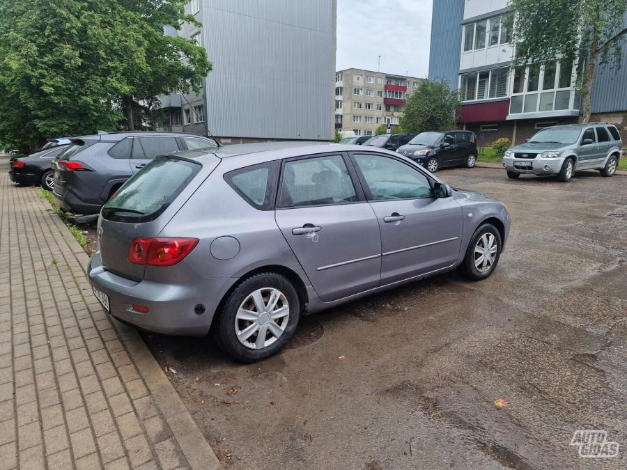 Pelēks Mazda 3 2004 Šauļi, ar dzinēja tilpumu 1.40 L un nobraukumu 290 tūkst. km par 350 €, foto 5 vietnē AUTOMOTO.COM.LV