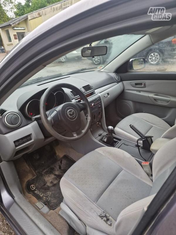 Pelēks Mazda 3 2004 Šauļi, ar dzinēja tilpumu 1.40 L un nobraukumu 290 tūkst. km par 350 €, foto 7 vietnē AUTOMOTO.COM.LV