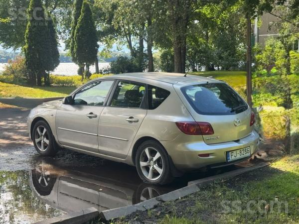 Grey Mazda 3 2005 in Riga, with an engine capacity of 1.60 L and mileage of 206 thousand km for 1500 €, photo 4 on AUTOMOTO.COM.LV