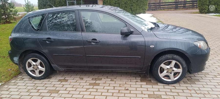 Grey Mazda 3 2006 in Klaipeda, with an engine capacity of 1.35 L and mileage of 288 thousand km for 1200 €, photo 2 on AUTOMOTO.COM.LV