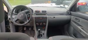 Grey Mazda 3 2006 in Klaipeda, with an engine capacity of 1.35 L and mileage of 288 thousand km for 1200 €, photo 6 on AUTOMOTO.COM.LV