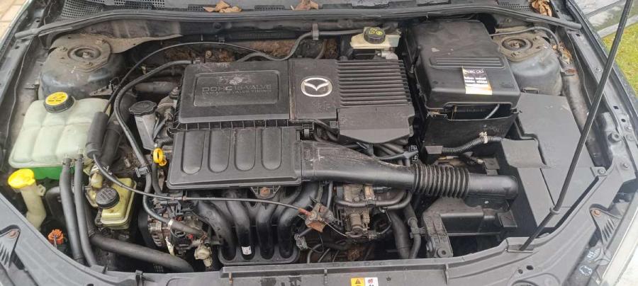Grey Mazda 3 2006 in Klaipeda, with an engine capacity of 1.35 L and mileage of 288 thousand km for 1200 €, photo 9 on AUTOMOTO.COM.LV