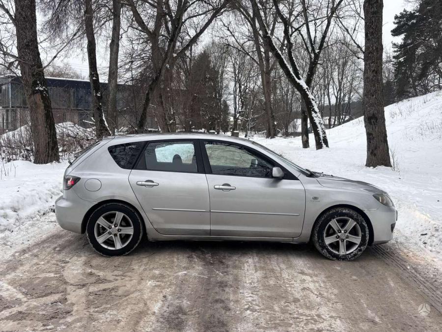 Grey Mazda 3 2006 in Vilnius, with an engine capacity of 1.56 L and mileage of 299 thousand km for 780 €, photo 4 on AUTOMOTO.COM.LV