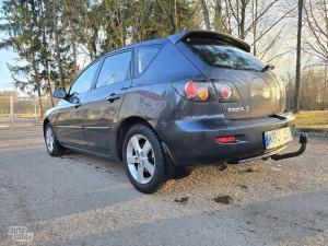 Grey Mazda 3 2006 in Radviliskis, with an engine capacity of 1.60 L and mileage of 321 thousand km for 1390 €, photo 8 on AUTOMOTO.COM.LV