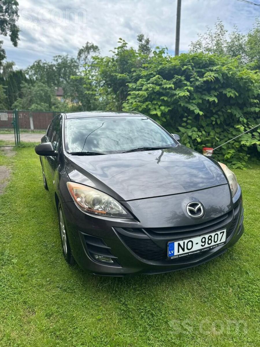 Grey Mazda 3 2009 in Riga, with an engine capacity of 1.60 L and mileage of 180 thousand km for 2000 €, photo 1 on AUTOMOTO.COM.LV