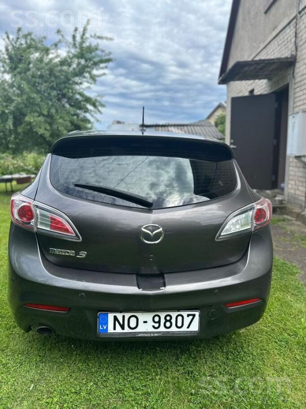 Grey Mazda 3 2009 in Riga, with an engine capacity of 1.60 L and mileage of 180 thousand km for 2000 €, photo 3 on AUTOMOTO.COM.LV