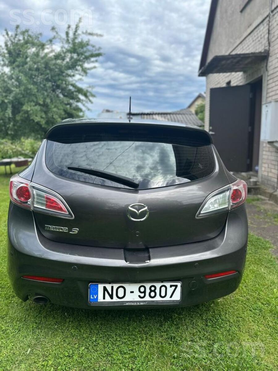 Grey Mazda 3 2009 in Riga, with an engine capacity of 1.60 L and mileage of 180 thousand km for 2000 €, photo 4 on AUTOMOTO.COM.LV