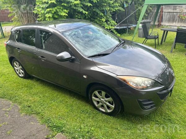Grey Mazda 3 2009 in Riga, with an engine capacity of 1.60 L and mileage of 180 thousand km for 2000 €, photo 5 on AUTOMOTO.COM.LV