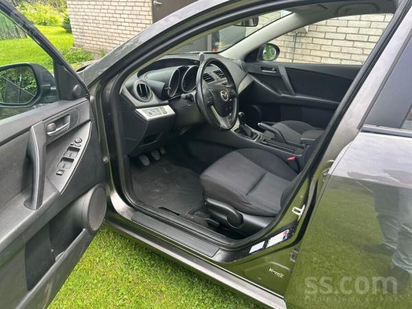 Grey Mazda 3 2009 in Riga, with an engine capacity of 1.60 L and mileage of 180 thousand km for 2000 €, photo 6 on AUTOMOTO.COM.LV