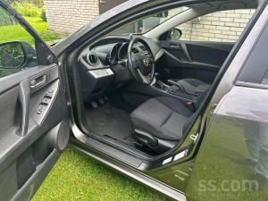 Grey Mazda 3 2009 in Riga, with an engine capacity of 1.60 L and mileage of 180 thousand km for 2000 €, photo 7 on AUTOMOTO.COM.LV