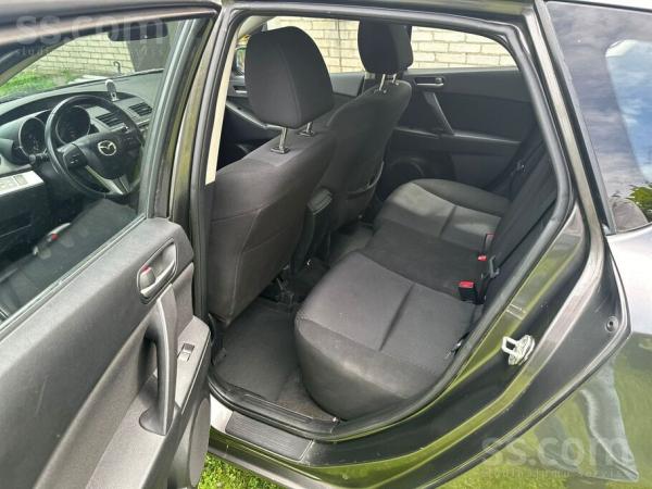 Grey Mazda 3 2009 in Riga, with an engine capacity of 1.60 L and mileage of 180 thousand km for 2000 €, photo 7 on AUTOMOTO.COM.LV