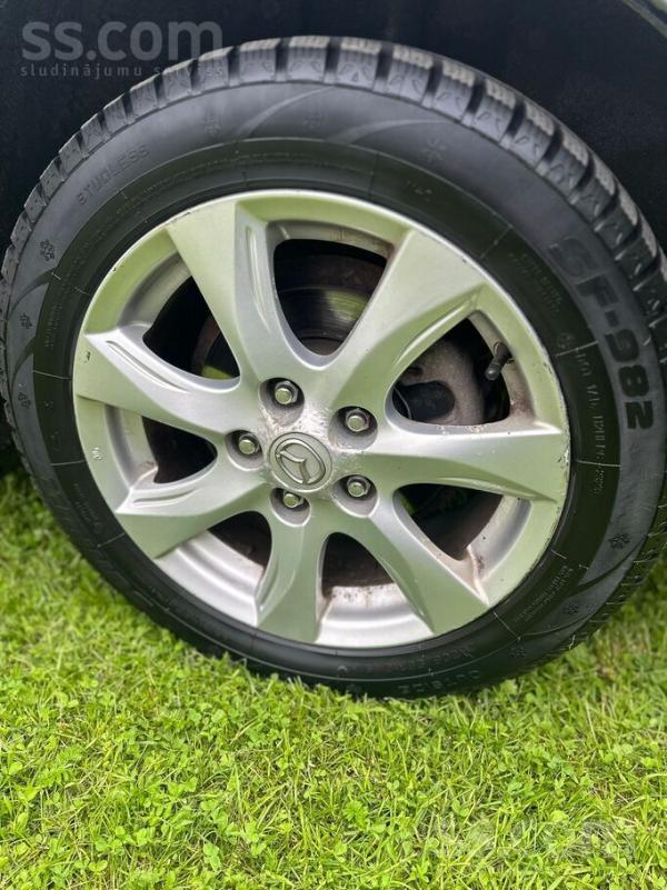 Grey Mazda 3 2009 in Riga, with an engine capacity of 1.60 L and mileage of 180 thousand km for 2000 €, photo 9 on AUTOMOTO.COM.LV