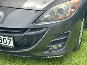 Grey Mazda 3 2009 in Riga, with an engine capacity of 1.60 L and mileage of 180 thousand km for 2000 €, photo 13 on AUTOMOTO.COM.LV