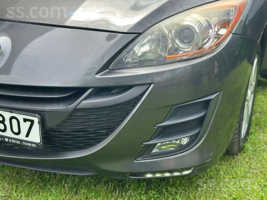 Grey Mazda 3 2009 in Riga, with an engine capacity of 1.60 L and mileage of 180 thousand km for 2000 €, photo 13 on AUTOMOTO.COM.LV