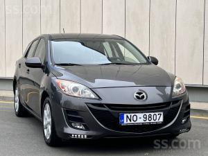 Pelēks Mazda 3 2009 Rīga, ar dzinēja tilpumu 1.60 L un nobraukumu 179 tūkst. km par 1750 €, foto  vietnē AUTOMOTO.COM.LV