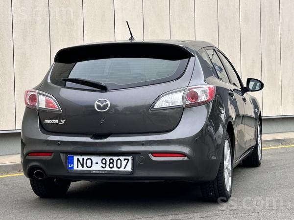 Pelēks Mazda 3 2009 Rīga, ar dzinēja tilpumu 1.60 L un nobraukumu 179 tūkst. km par 1750 €, foto 3 vietnē AUTOMOTO.COM.LV