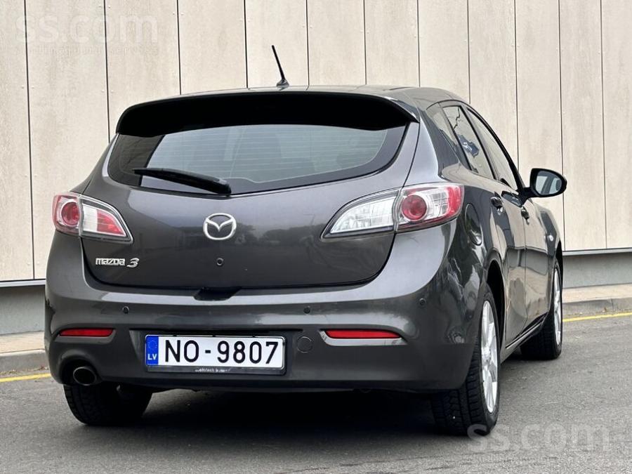 Pelēks Mazda 3 2009 Rīga, ar dzinēja tilpumu 1.60 L un nobraukumu 179 tūkst. km par 1750 €, foto 4 vietnē AUTOMOTO.COM.LV