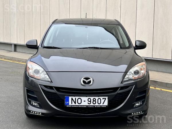 Pelēks Mazda 3 2009 Rīga, ar dzinēja tilpumu 1.60 L un nobraukumu 179 tūkst. km par 1750 €, foto 5 vietnē AUTOMOTO.COM.LV