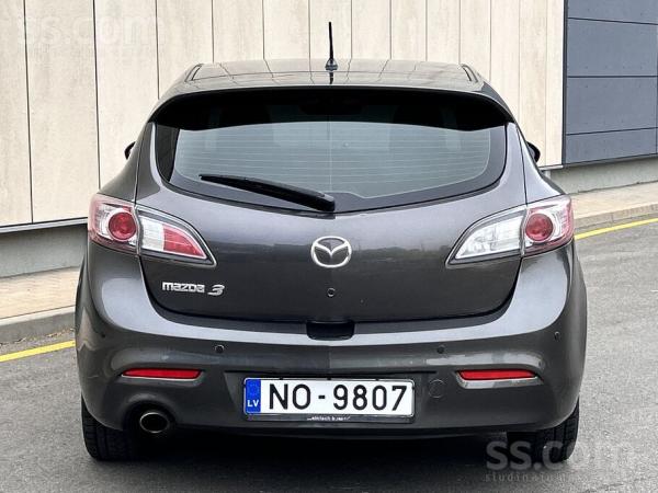 Pelēks Mazda 3 2009 Rīga, ar dzinēja tilpumu 1.60 L un nobraukumu 179 tūkst. km par 1750 €, foto 6 vietnē AUTOMOTO.COM.LV