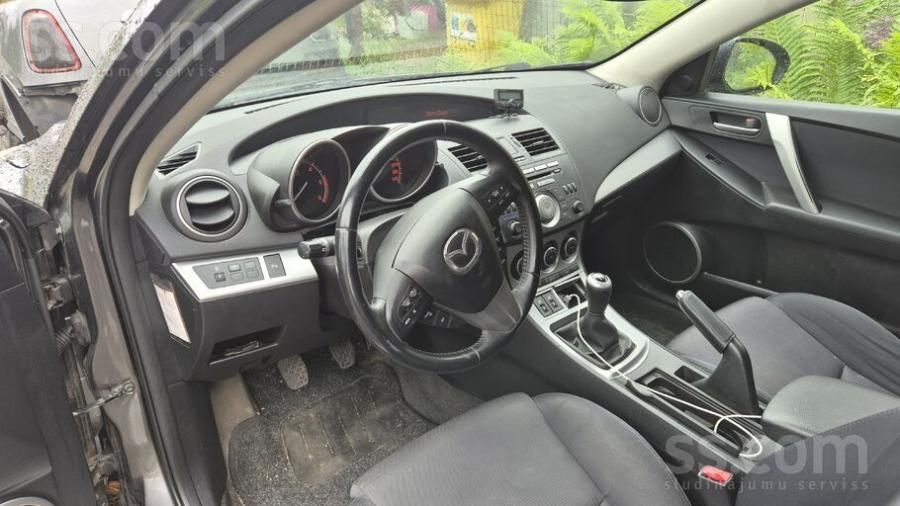 Pelēks Mazda 3 2010 Rīga, ar dzinēja tilpumu 1.60 L un nobraukumu 275 tūkst. km par 2799 €, foto 4 vietnē AUTOMOTO.COM.LV