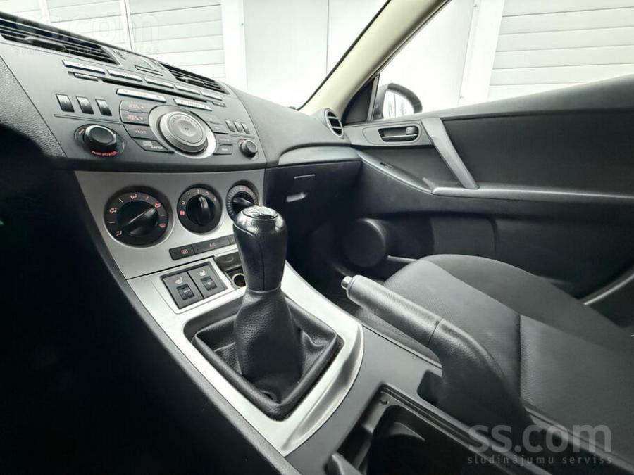 Grey Mazda 3 2010 in Riga, with an engine capacity of 1.60 L and mileage of 245 thousand km for 1300 €, photo 12 on AUTOMOTO.COM.LV