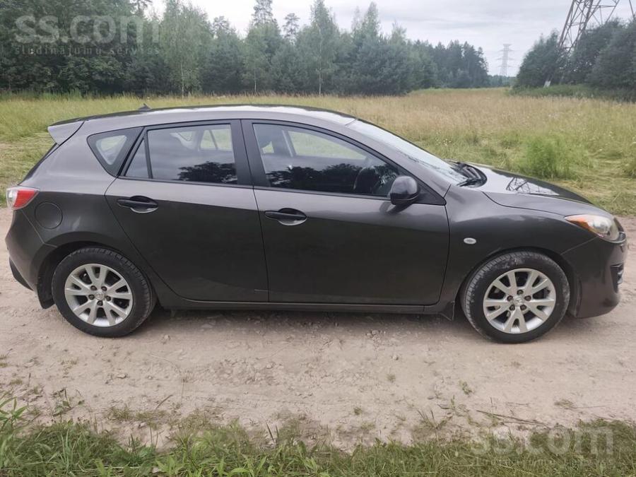 Grey Mazda 3 2010 in Riga, with an engine capacity of 1.60 L and mileage of 156 thousand km for 3200 €, photo 10 on AUTOMOTO.COM.LV