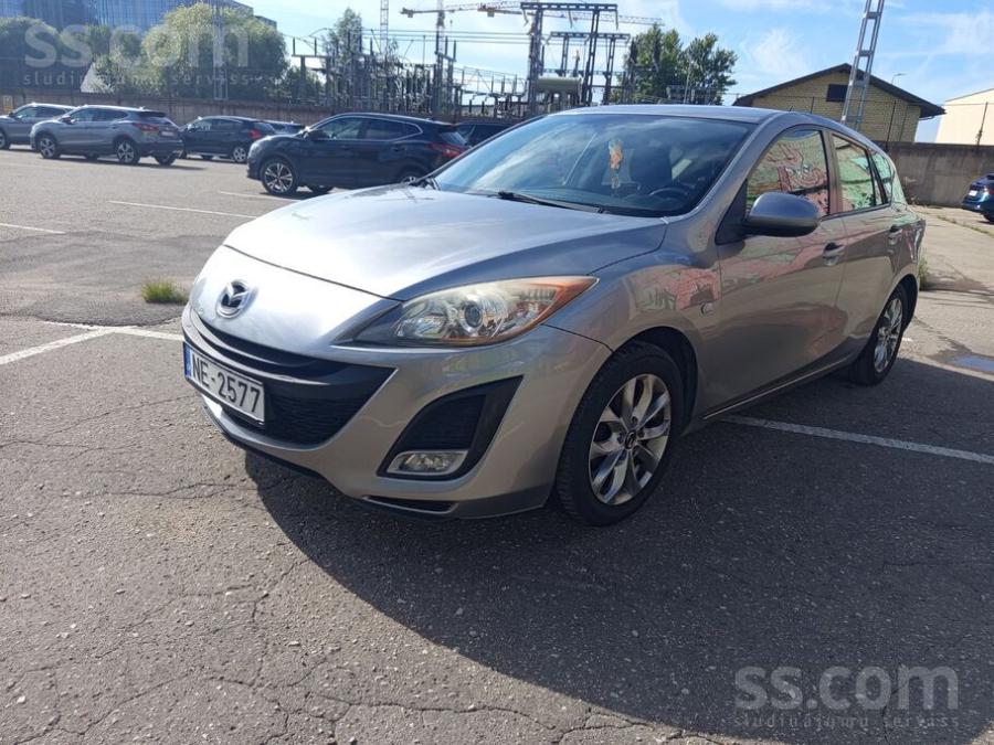 Pelēks Mazda 3 2010 Rīga, ar dzinēja tilpumu 1.60 L un nobraukumu 233 tūkst. km par 2200 €, foto 3 vietnē AUTOMOTO.COM.LV