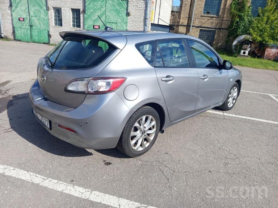 Pelēks Mazda 3 2010 Rīga, ar dzinēja tilpumu 1.60 L un nobraukumu 233 tūkst. km par 2200 €, foto 7 vietnē AUTOMOTO.COM.LV