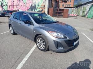 Pelēks Mazda 3 2010 Rīga, ar dzinēja tilpumu 1.60 L un nobraukumu 233 tūkst. km par 2200 €, foto  vietnē AUTOMOTO.COM.LV