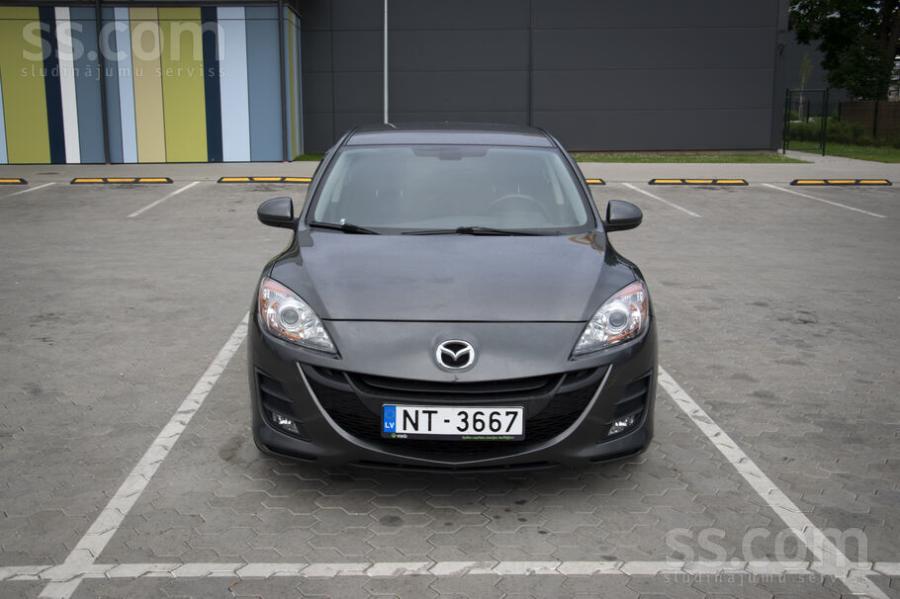 Grey Mazda 3 2011 in Riga, with an engine capacity of 1.60 L and mileage of 284 thousand km for 2990 €, photo 4 on AUTOMOTO.COM.LV