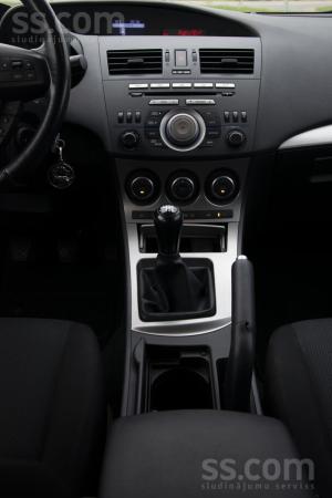 Grey Mazda 3 2011 in Riga, with an engine capacity of 1.60 L and mileage of 284 thousand km for 2990 €, photo 14 on AUTOMOTO.COM.LV