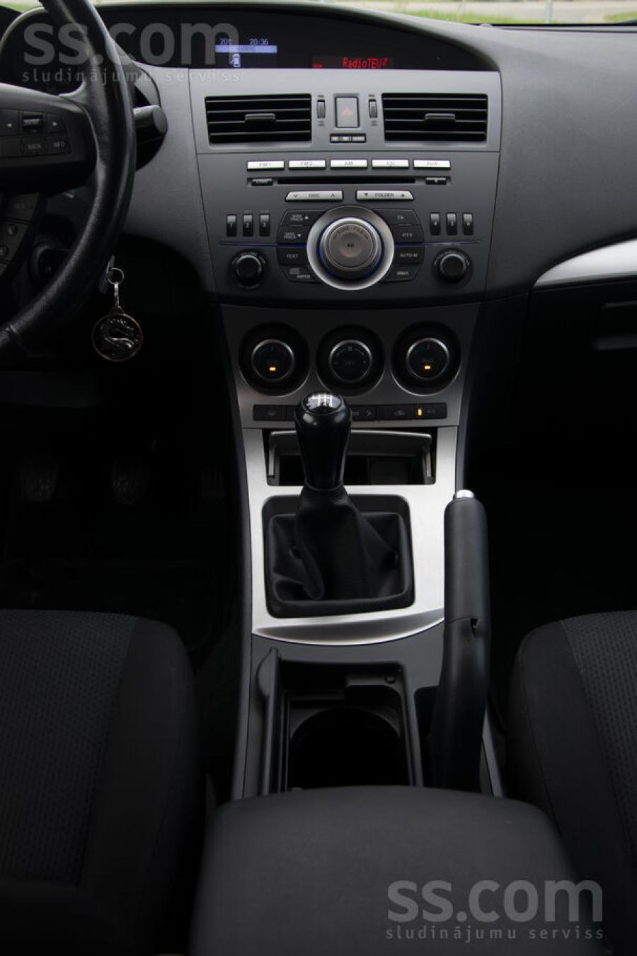 Grey Mazda 3 2011 in Riga, with an engine capacity of 1.60 L and mileage of 284 thousand km for 2990 €, photo 14 on AUTOMOTO.COM.LV