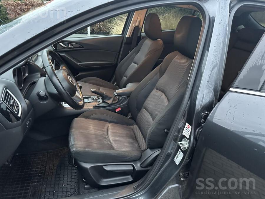 Grey Mazda 3 2015 in Riga, with an engine capacity of 2.20 L and mileage of 189 thousand km for 6950 €, photo 14 on AUTOMOTO.COM.LV