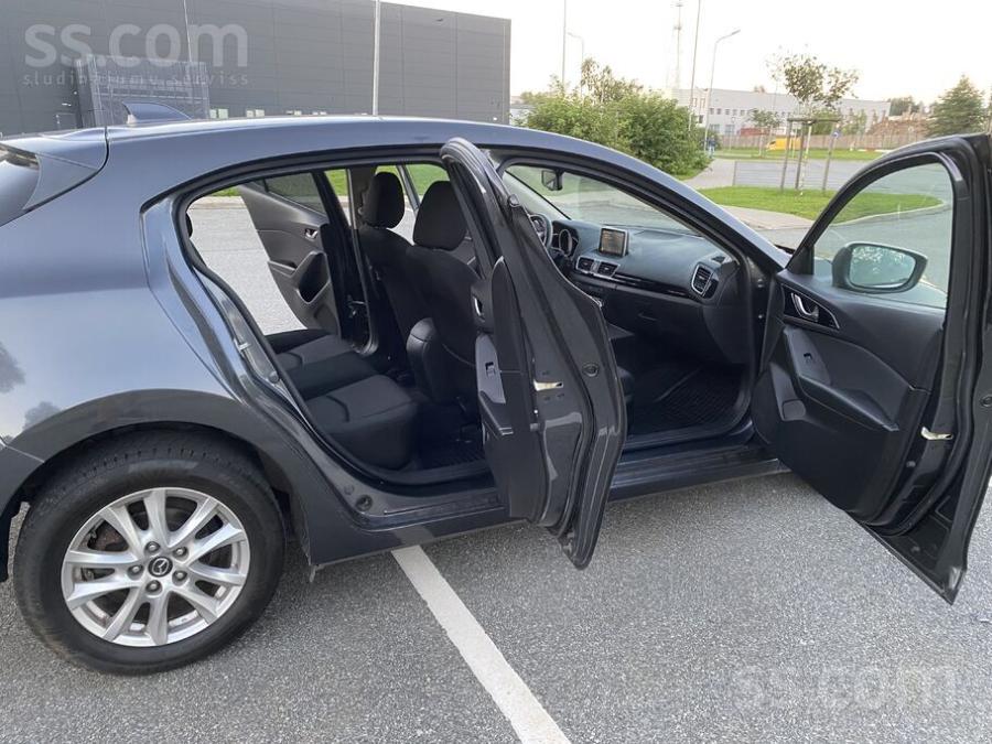 Grey Mazda 3 2015 in Riga, with an engine capacity of 2.20 L and mileage of 192 thousand km for 5350 €, photo 15 on AUTOMOTO.COM.LV