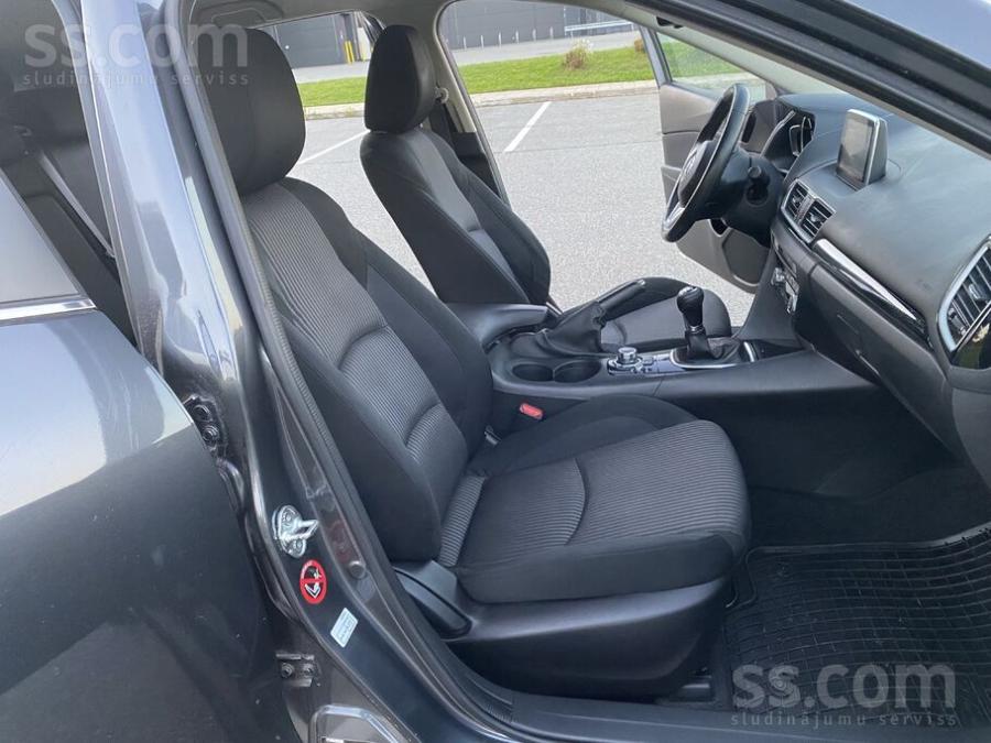Grey Mazda 3 2015 in Riga, with an engine capacity of 2.20 L and mileage of 192 thousand km for 5350 €, photo 18 on AUTOMOTO.COM.LV