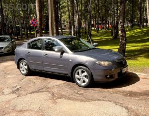 Pelēks Mazda 3 2007 Rīga, ar dzinēja tilpumu 1.60 L un nobraukumu 210 tūkst. km par 1000 €, foto 4 vietnē AUTOMOTO.COM.LV