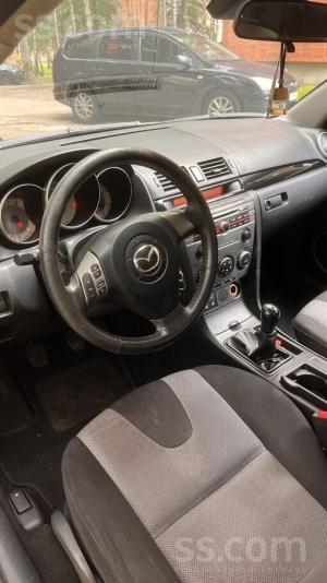 Grey Mazda 3 2007 in Riga, with an engine capacity of 1.60 L and mileage of 210 thousand km for 1000 €, photo 8 on AUTOMOTO.COM.LV