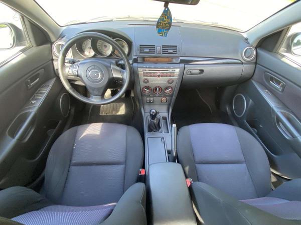 Grey Mazda 3 2007 in Prienai, with an engine capacity of 1.60 L and mileage of 146 thousand km for 1350 €, photo 7 on AUTOMOTO.COM.LV