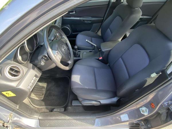 Grey Mazda 3 2007 in Prienai, with an engine capacity of 1.60 L and mileage of 146 thousand km for 1350 €, photo 9 on AUTOMOTO.COM.LV