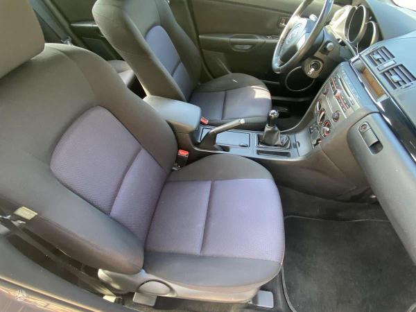 Grey Mazda 3 2007 in Prienai, with an engine capacity of 1.60 L and mileage of 146 thousand km for 1350 €, photo 10 on AUTOMOTO.COM.LV