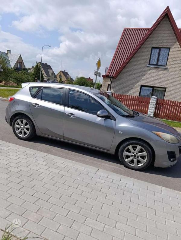 Grey Mazda 3 2009 in Kursenai, with an engine capacity of 1.60 L and mileage of 270 thousand km for 1700 €, photo 2 on AUTOMOTO.COM.LV