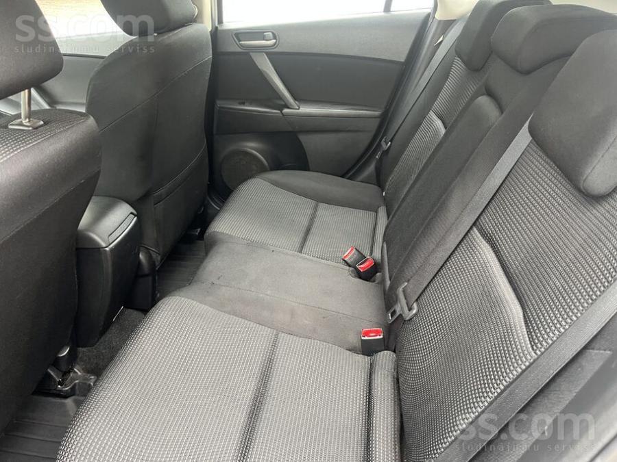 Pelēks Mazda 3 2013 Rīga, ar dzinēja tilpumu 1.60 L un nobraukumu 317 tūkst. km par 2300 €, foto 19 vietnē AUTOMOTO.COM.LV