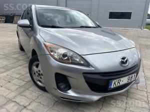 Pelēks Mazda 3 2013 Rīga, ar dzinēja tilpumu 1.60 L un nobraukumu 317 tūkst. km par 2300 €, foto 4 vietnē AUTOMOTO.COM.LV