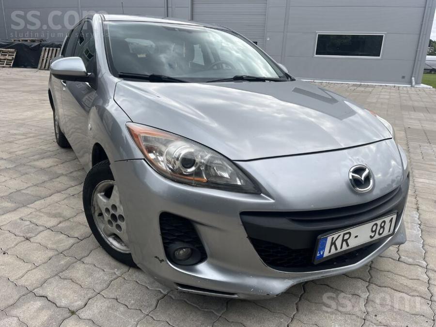 Pelēks Mazda 3 2013 Rīga, ar dzinēja tilpumu 1.60 L un nobraukumu 317 tūkst. km par 2300 €, foto 4 vietnē AUTOMOTO.COM.LV