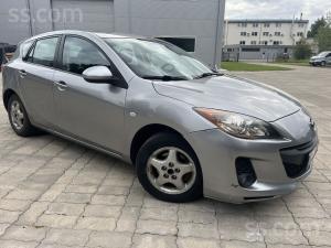 Pelēks Mazda 3 2013 Rīga, ar dzinēja tilpumu 1.60 L un nobraukumu 317 tūkst. km par 2300 €, foto 5 vietnē AUTOMOTO.COM.LV
