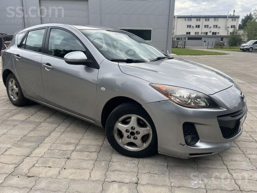 Pelēks Mazda 3 2013 Rīga, ar dzinēja tilpumu 1.60 L un nobraukumu 317 tūkst. km par 2300 €, foto 5 vietnē AUTOMOTO.COM.LV