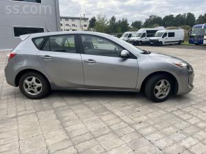 Pelēks Mazda 3 2013 Rīga, ar dzinēja tilpumu 1.60 L un nobraukumu 317 tūkst. km par 2300 €, foto 6 vietnē AUTOMOTO.COM.LV