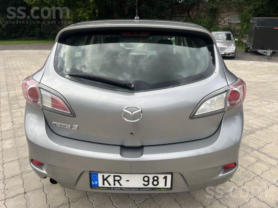 Pelēks Mazda 3 2013 Rīga, ar dzinēja tilpumu 1.60 L un nobraukumu 317 tūkst. km par 2300 €, foto 8 vietnē AUTOMOTO.COM.LV